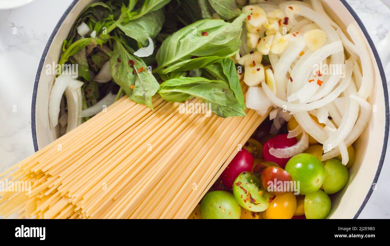 Flat lay. Step by step. Cooking on pot pasta recipe in an enameled cast ...