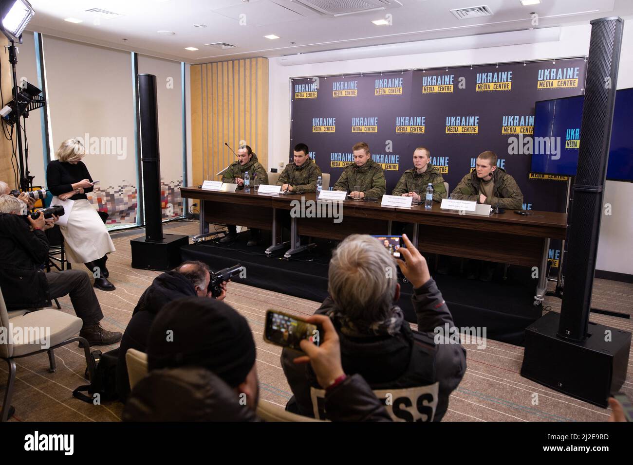 Russian soldiers now prisoners speak during a press conference at the ...