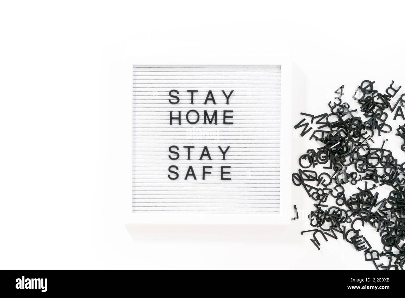STAY HOME and STAY SAFE sign on message board Stock Photo - Alamy