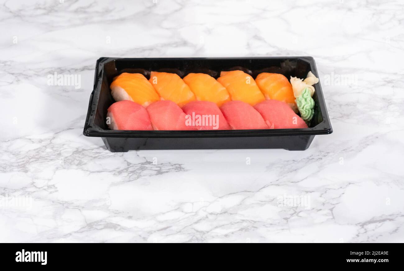 Pre-packaged sushi in a plastic tray Stock Photo - Alamy