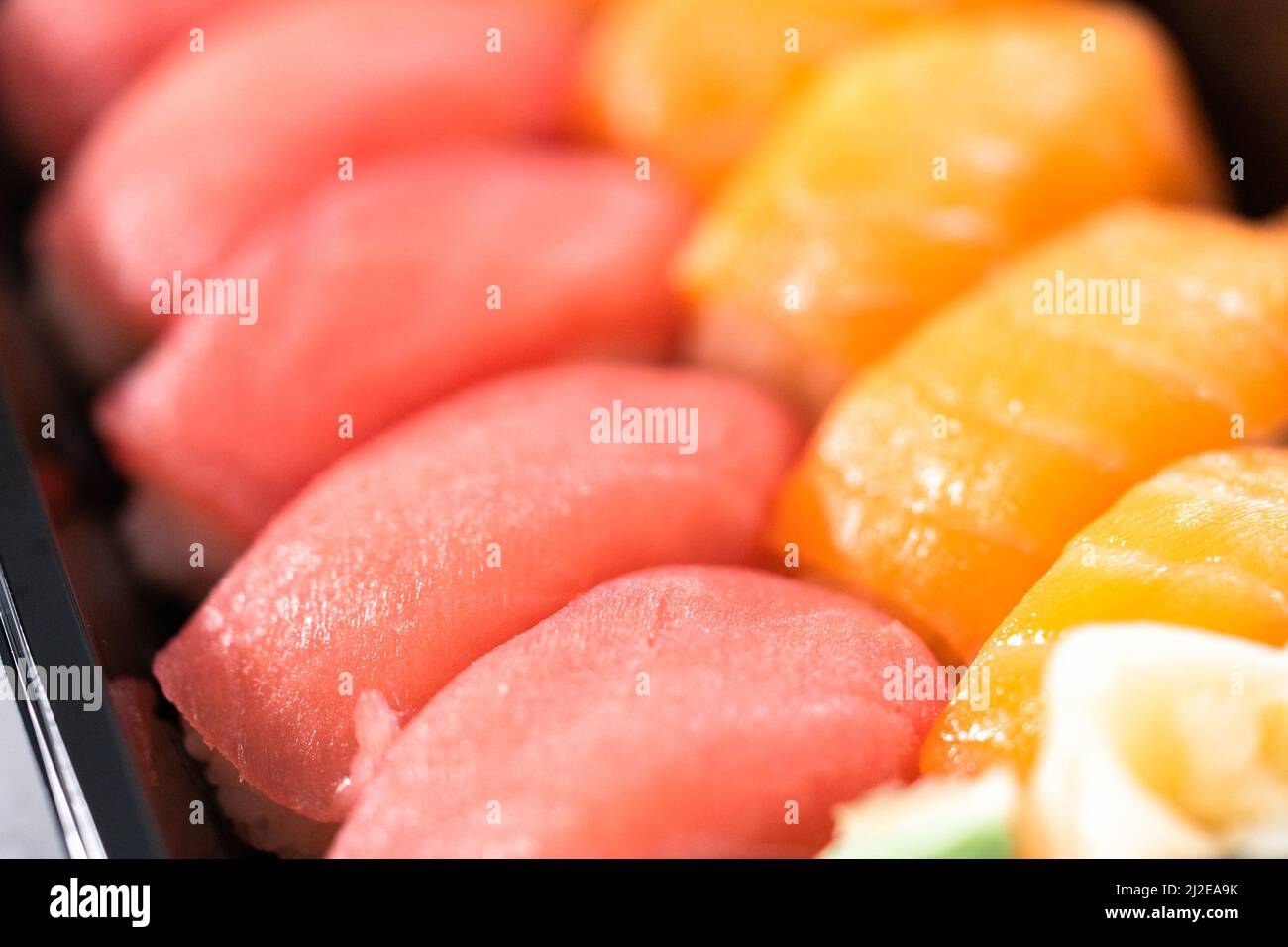 Pre-packaged sushi in a plastic tray Stock Photo - Alamy