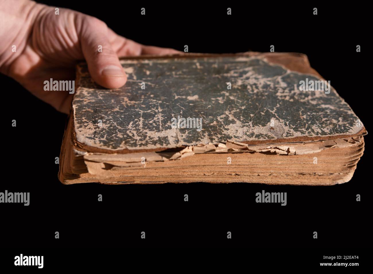 Old male hand hold the bible hi-res stock photography and images - Alamy