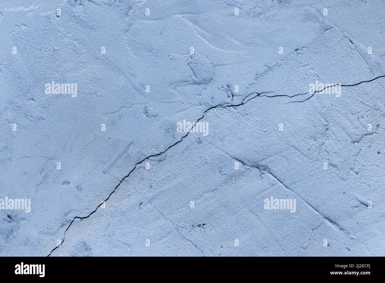 Crack on old dirty blue paint concrete wall of cement surface broken ...