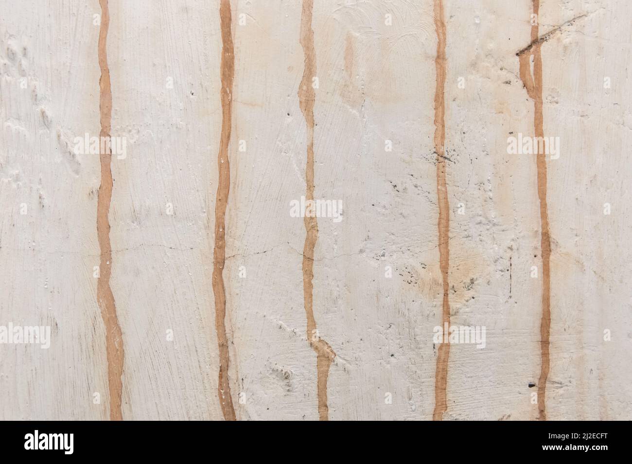 Old dirty concrete white wall with streaks of rusty water weathered ...
