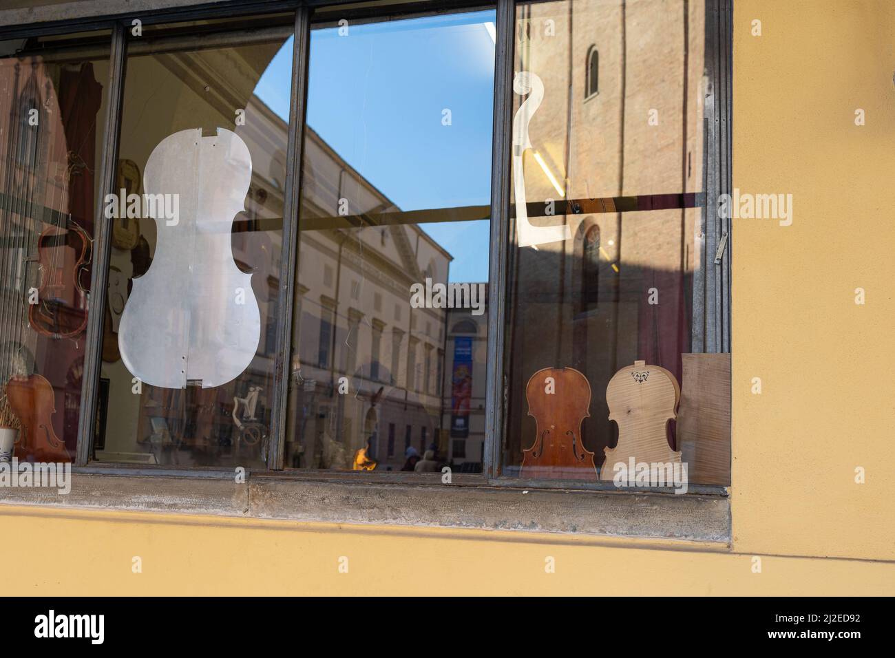 Store Window of a Luthier's Shop: Handmade Violins on Display Stock ...