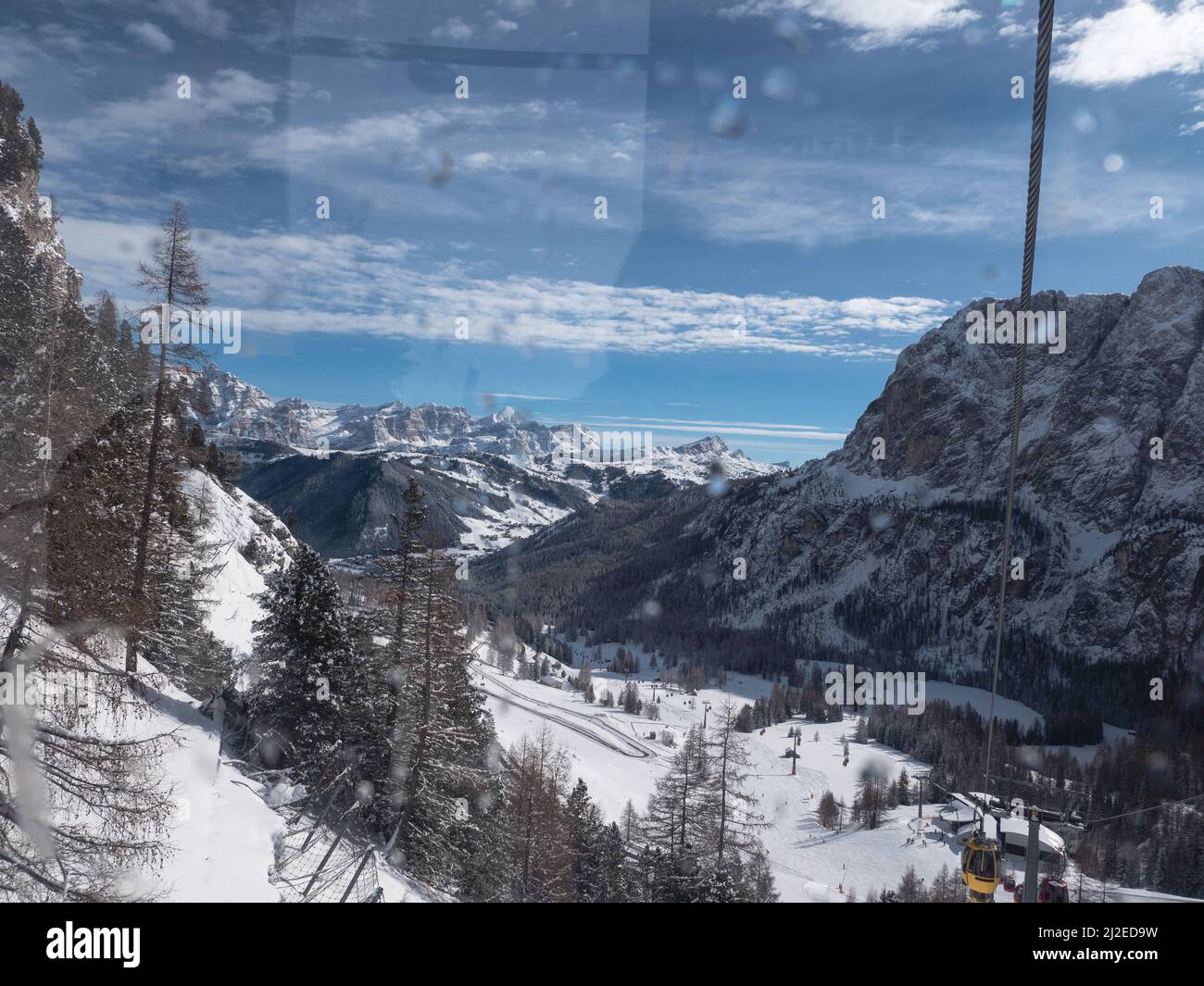 The Snowy Italian Alps Mountains: view from inside a Cabin of a ...