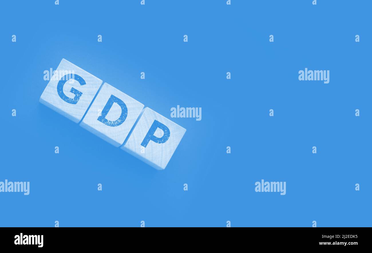 GDP, Gross Domestic Product concept, cube wooden block with alphabet ...