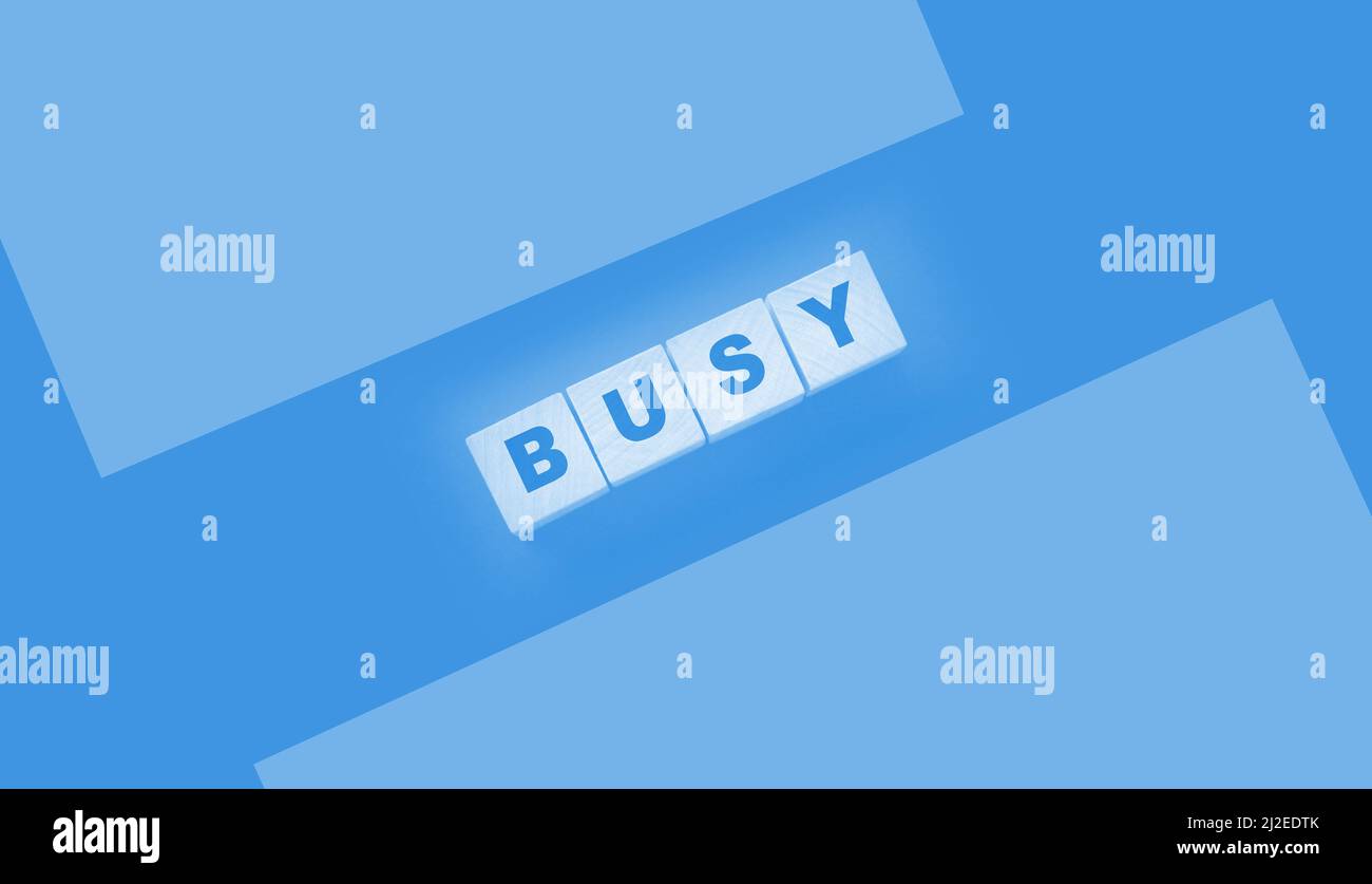 Word Busy made with cube wooden blocks. Business career concept Stock ...