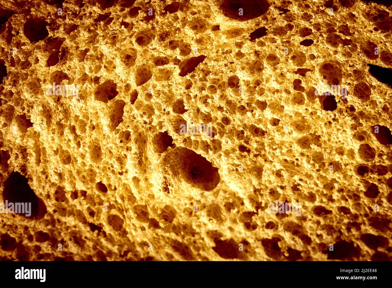 texture of brown bread as a close up background. backdrop of rough ...