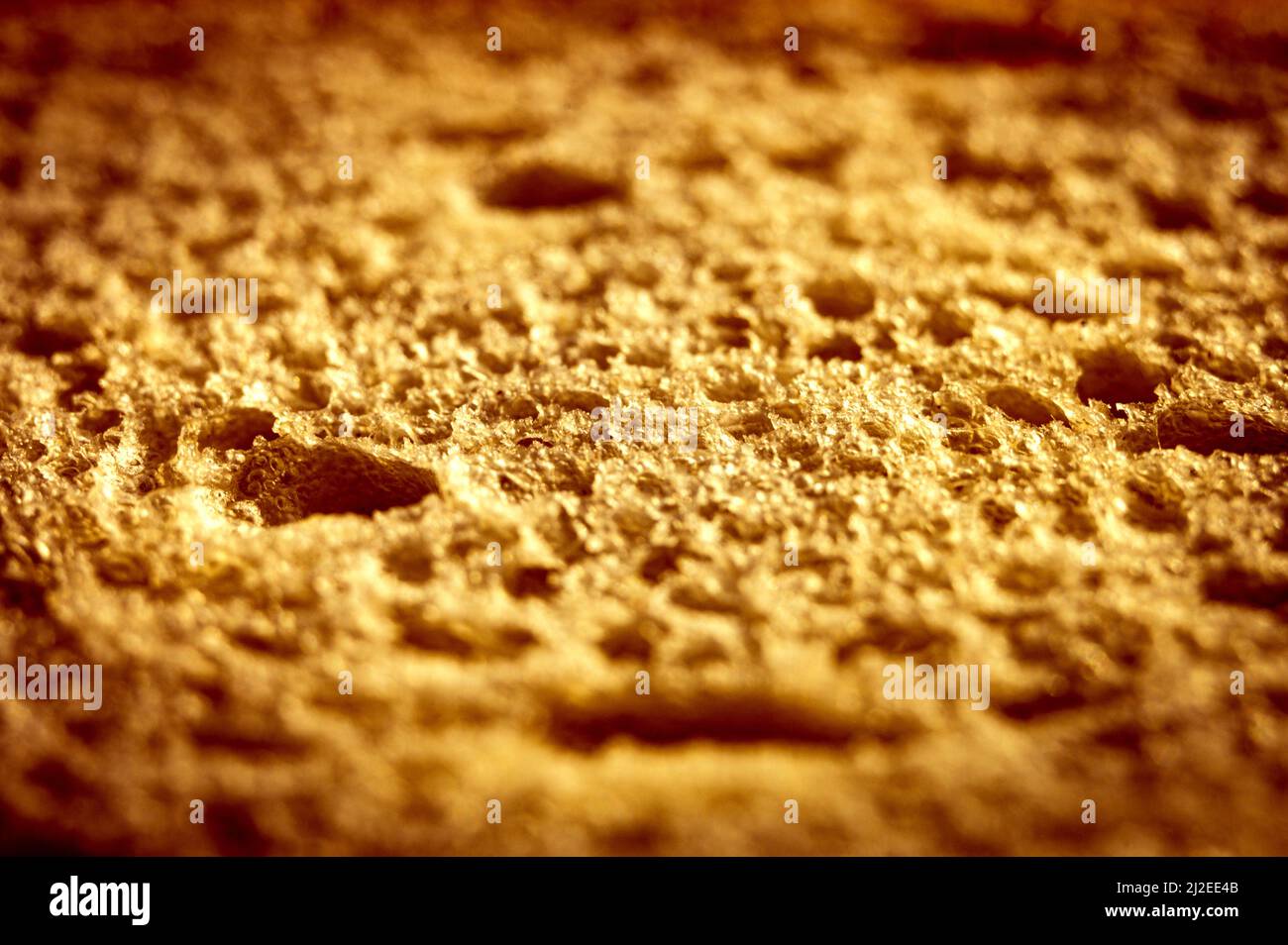 texture brown bread as close up background. backdrop of rough dappled ...