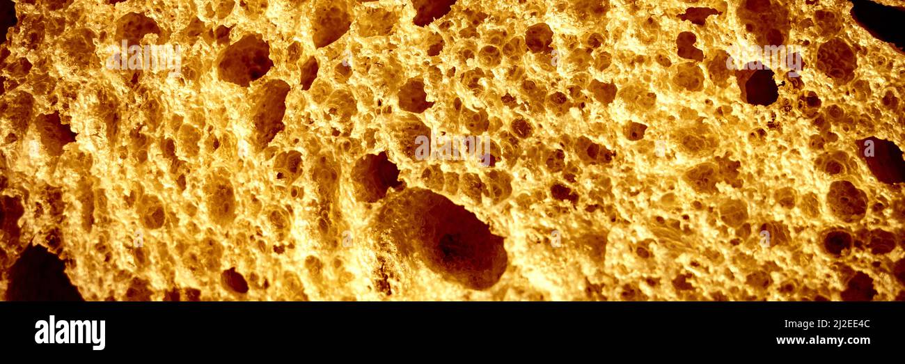 texture of brown bread as a close up background. backdrop of rough ...