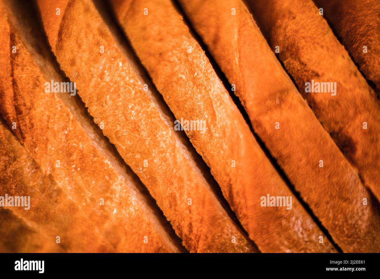 slices of white bread close up as a background. backdrop of rough ...