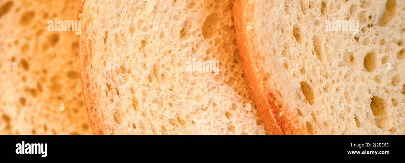 texture of slices white bread as a close up background. backdrop of ...