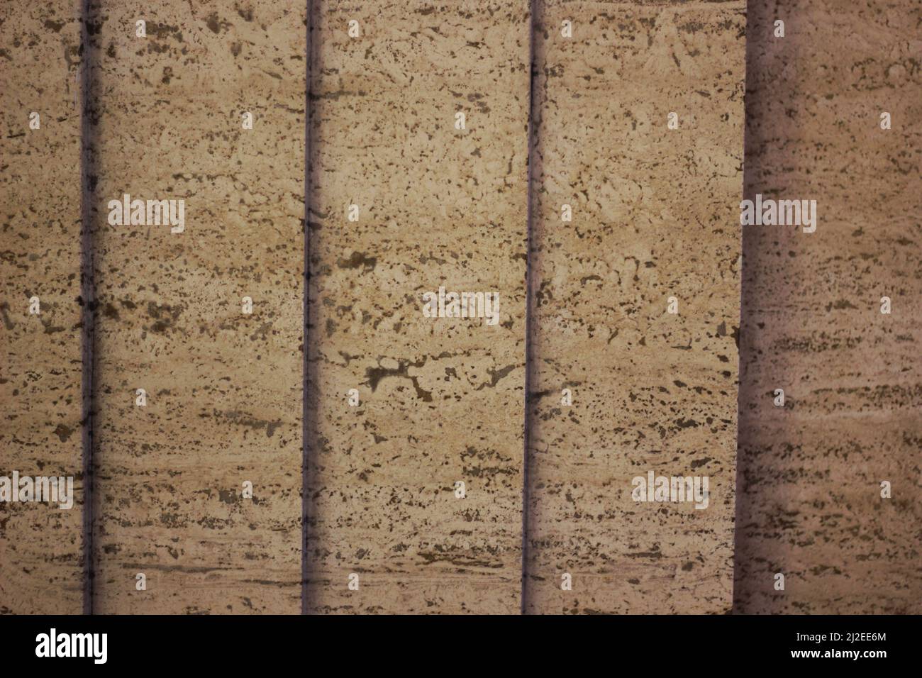 Beautiful column made of natural stone granite as a decorative building ...