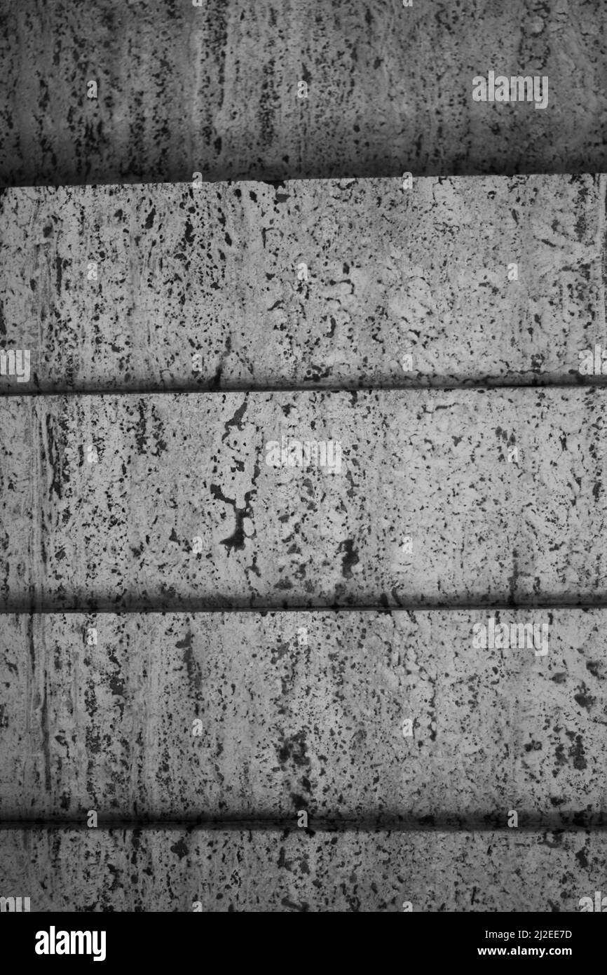 Beautiful column made of natural stone granite as a decorative building ...