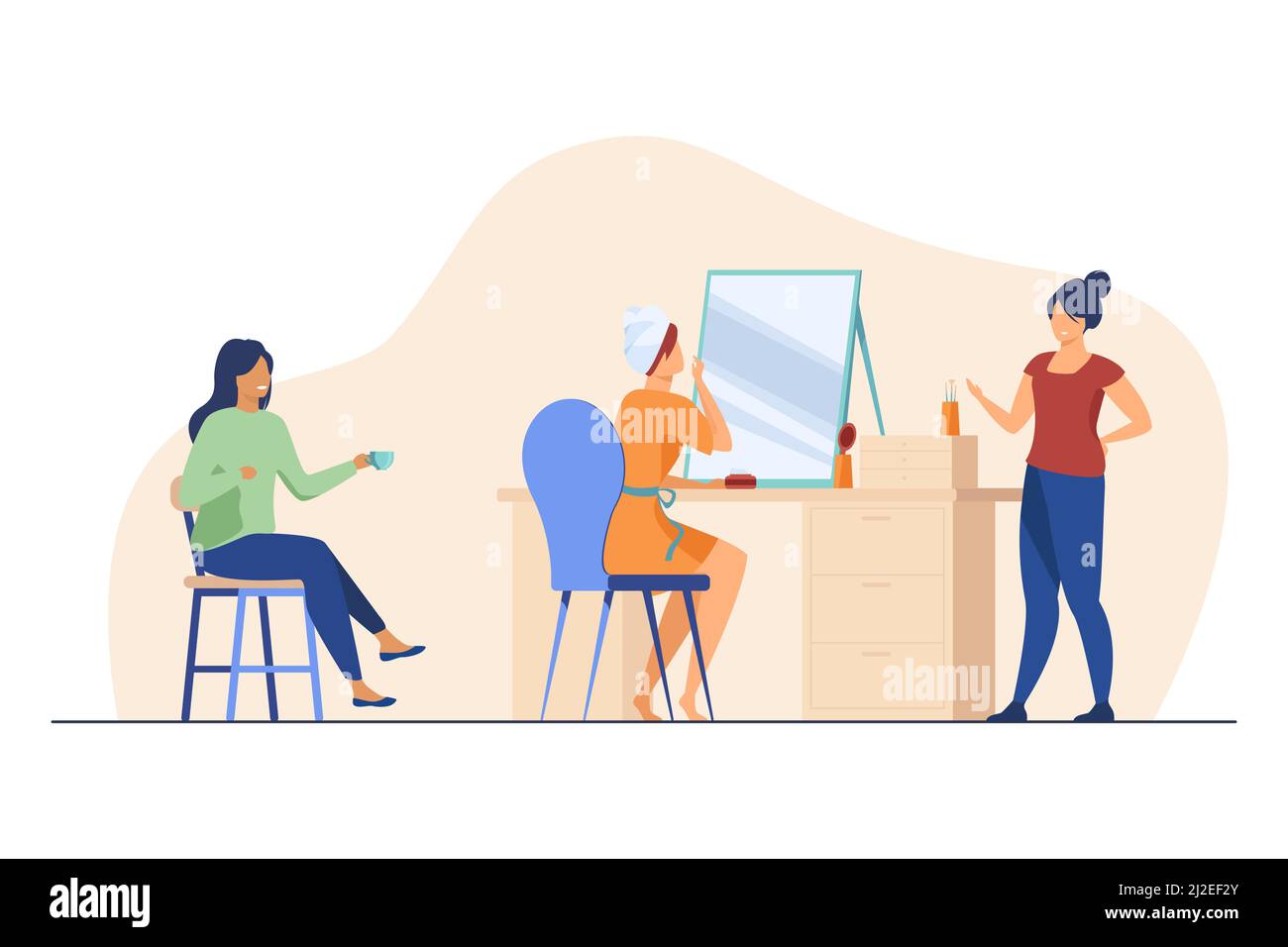 Woman applying makeup while chatting with female friends. Girls ...