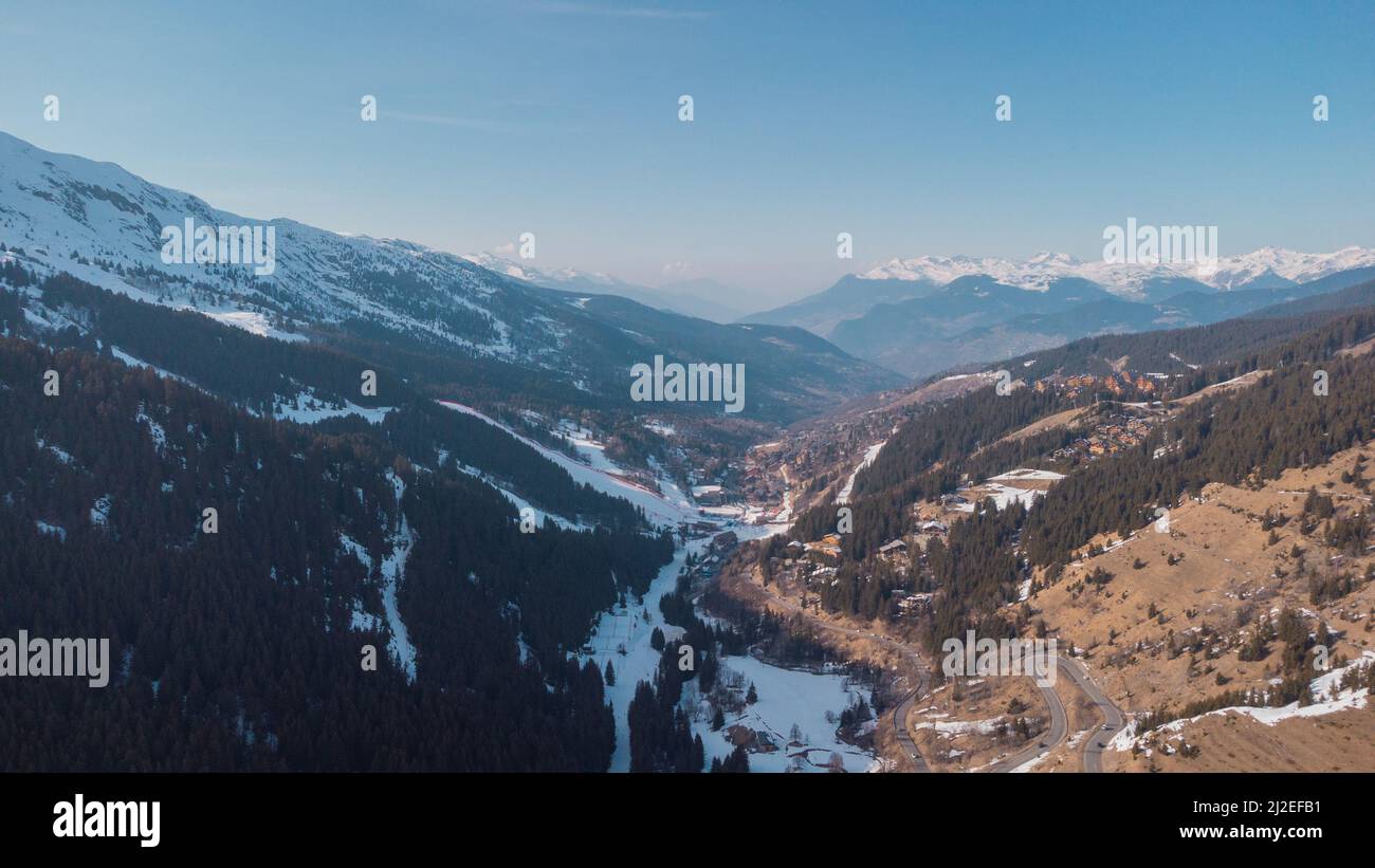 Aerial panorama of Meribel village, on the end of the valley in the ...