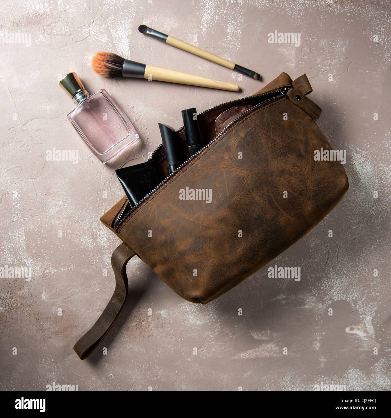 handmade leather makeup bag with makeup kit Stock Photo - Alamy