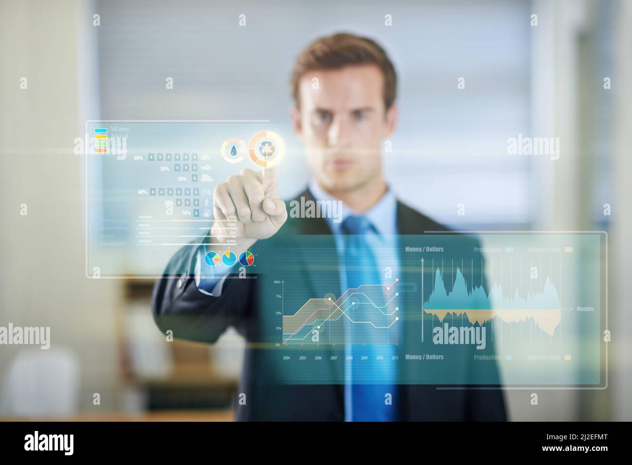 Connected to modern business channels. Cropped shot of a handsome young ...