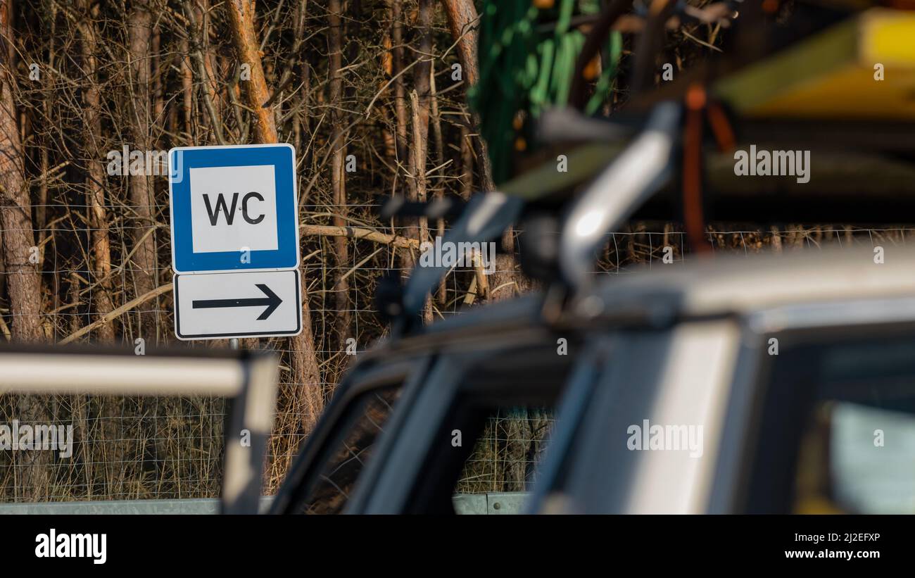 Sign for a toilet or WC on public car parking. Traffic sign for toilet ...