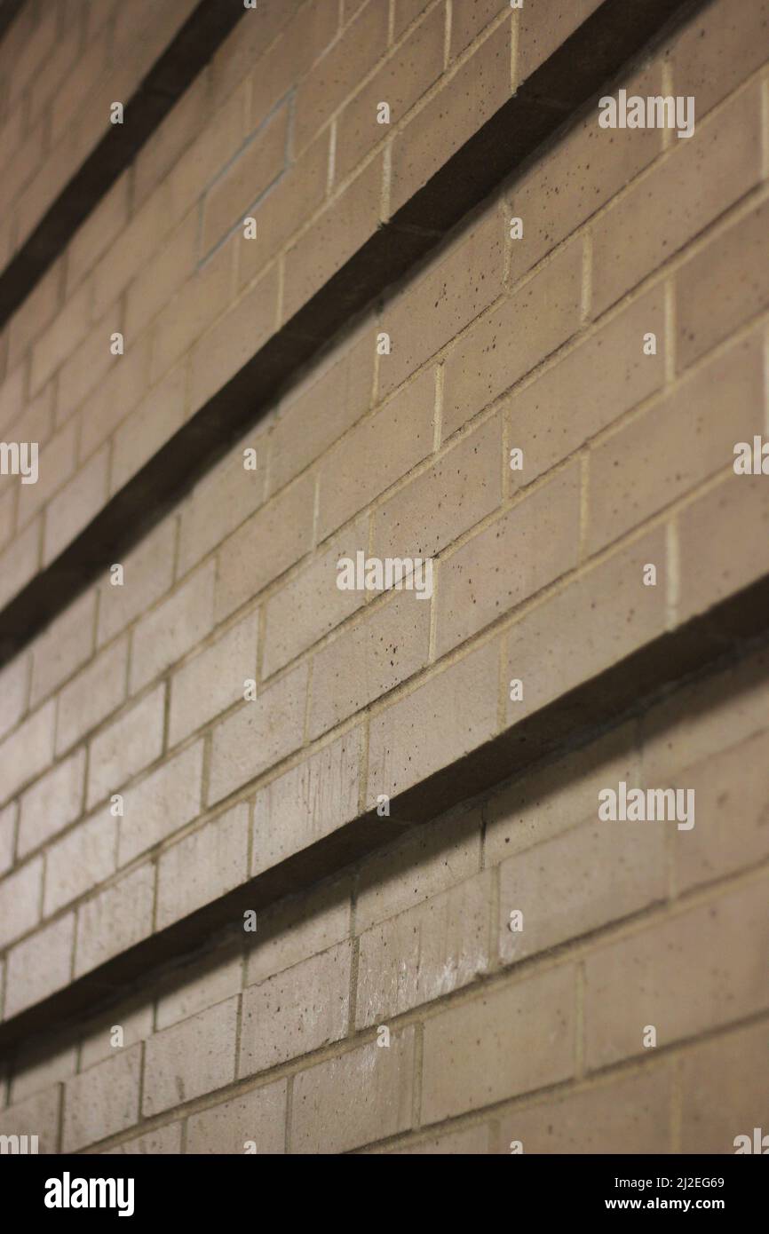 Minimalist view of a brick wall with strong horizontal lines Stock ...