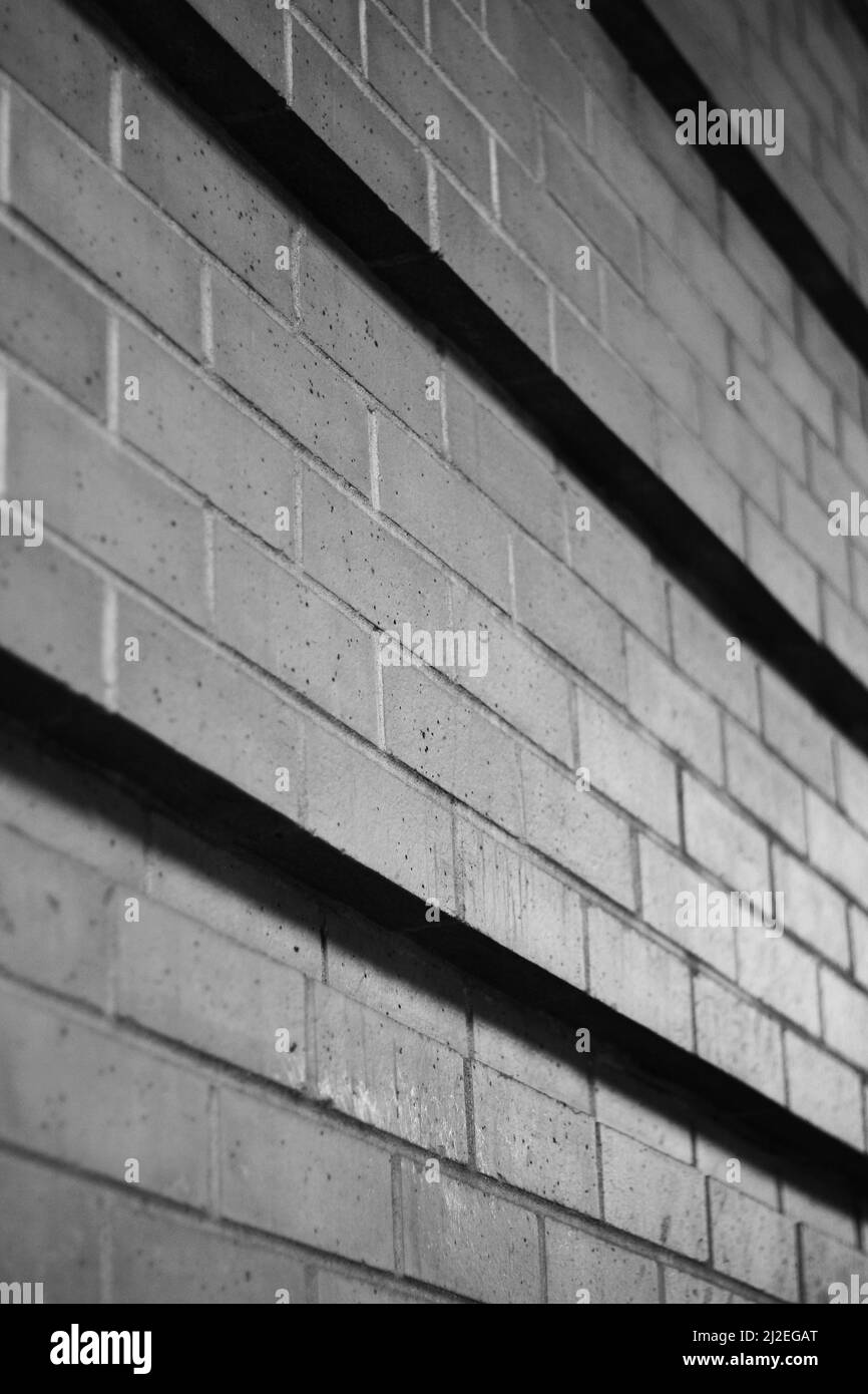 Minimalist view of a brick wall with strong horizontal lines Stock ...