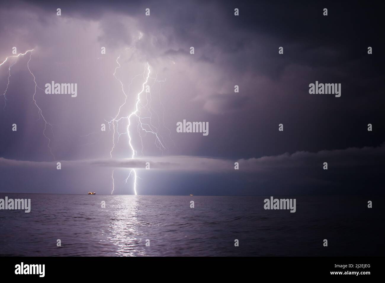 summer storm beginning with lightning Stock Photo - Alamy