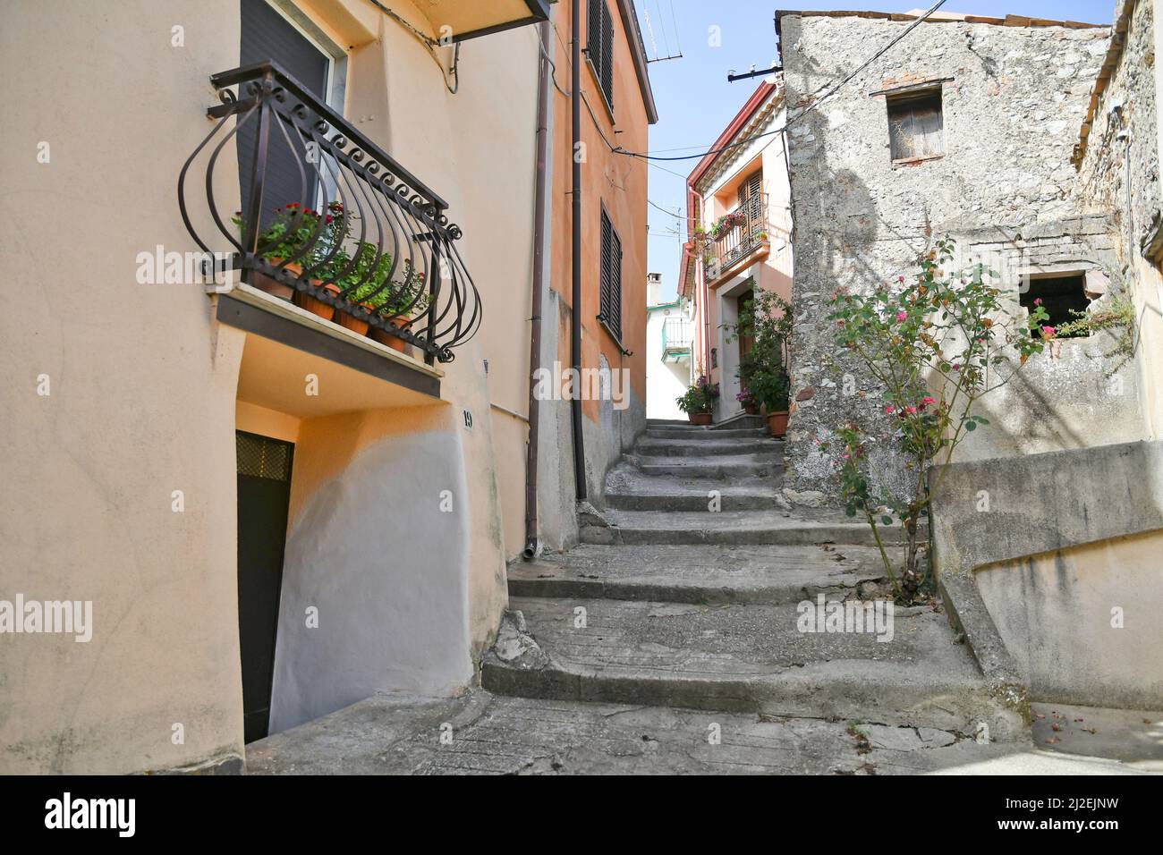 A narrow street in Acri, a village in Calabria, Italy Stock Photo - Alamy