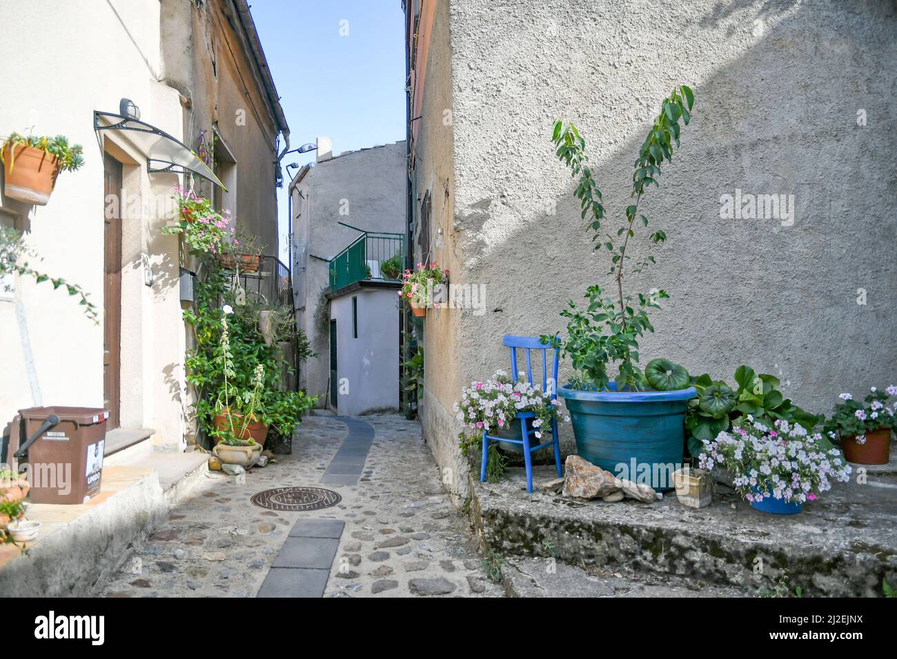A narrow street in Acri, a village in Calabria, Italy Stock Photo - Alamy
