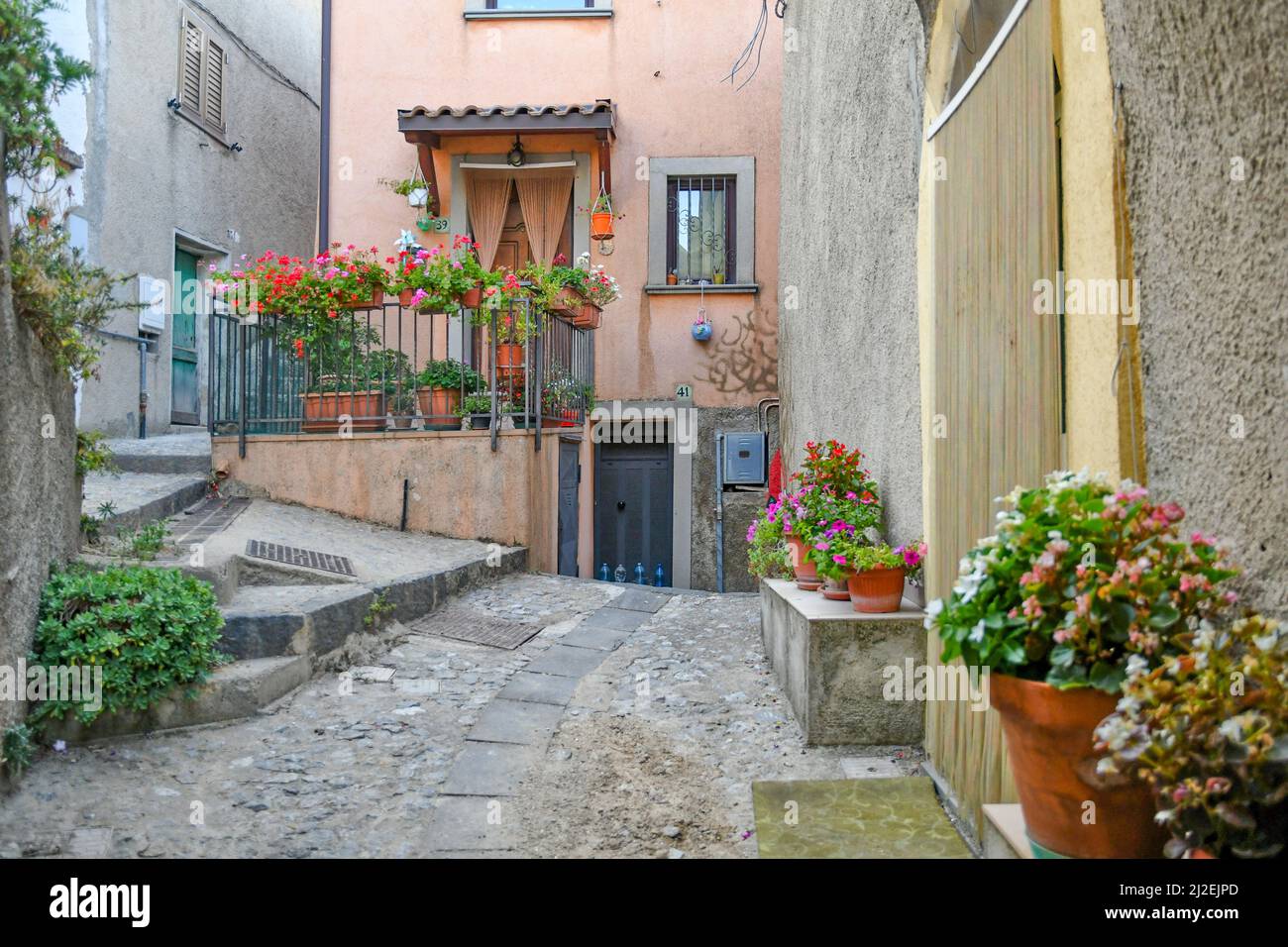 A narrow street in Acri, a village in Calabria, Italy Stock Photo - Alamy