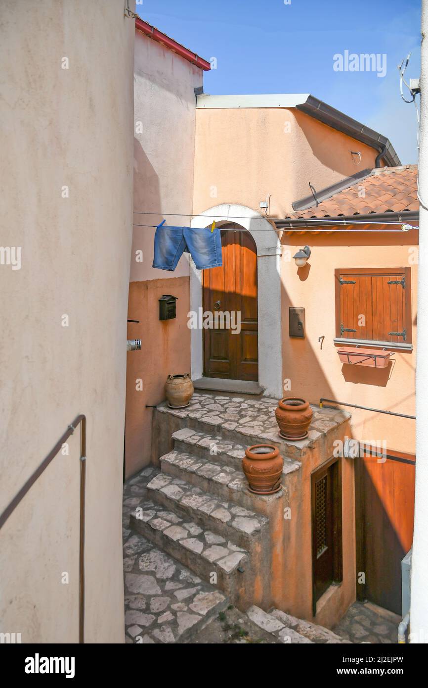 A narrow street in Acri, a village in Calabria, Italy Stock Photo - Alamy