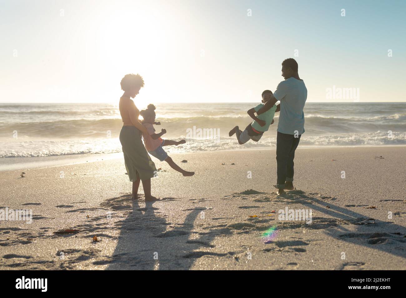 Mother daughter spinning beach hi-res stock photography and images - Alamy