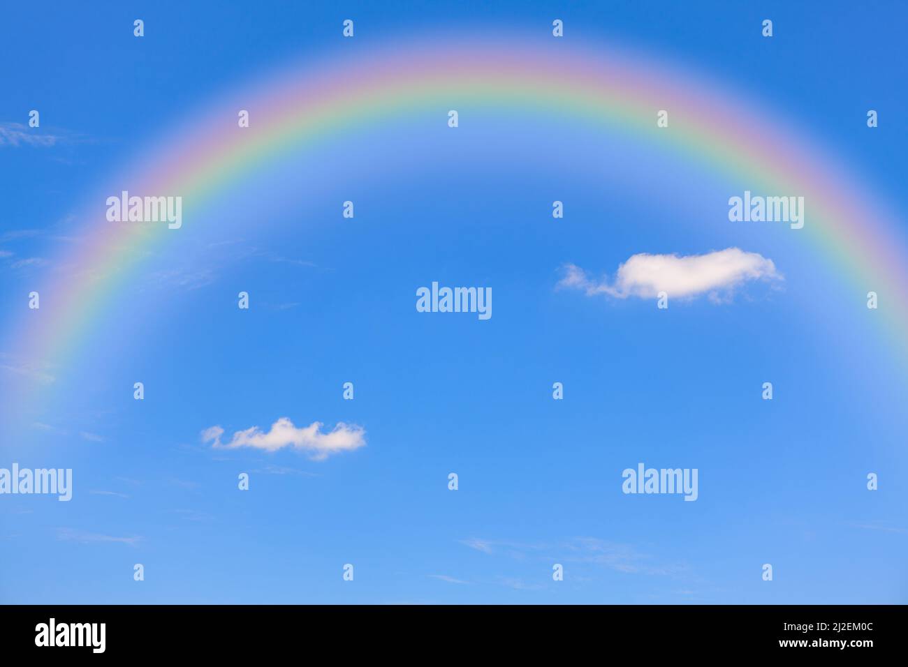 Rainbow on the summer sky . Natural phenomenon in the sky Stock Photo ...