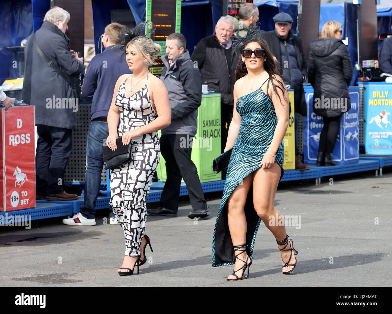 Racegoers arriving for the Coral Scottish Grand National Ladies Day at ...