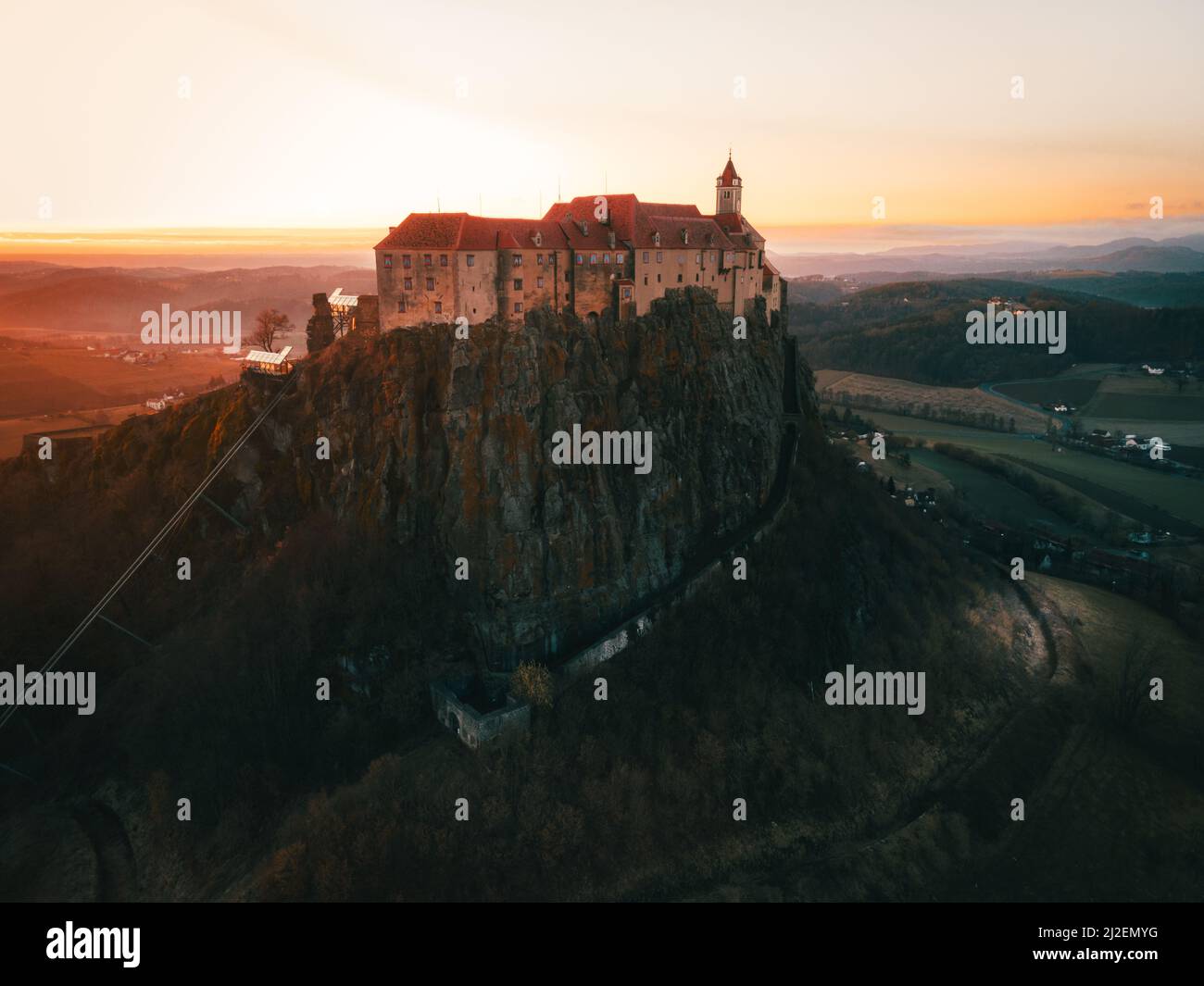 Aerial panorama view of historic old medieval castle Riegersburg on ...