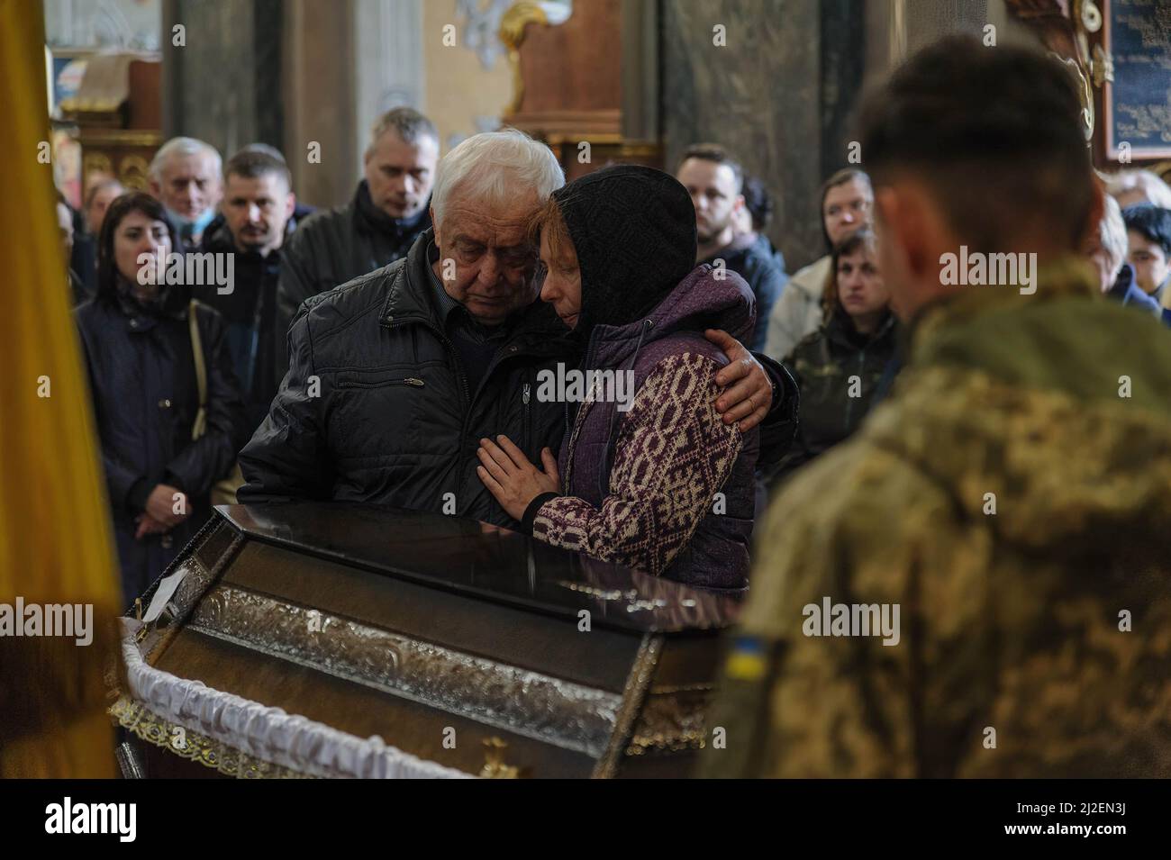 Lviv, Ukraine. 31st Mar, 2022. A Ukrainian woman seen crying next to a ...