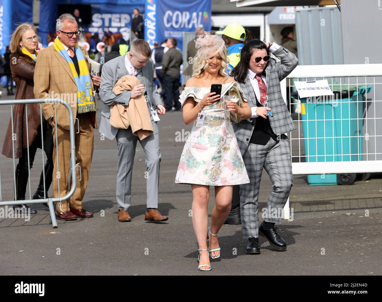 Racegoers arriving for the Coral Scottish Grand National Ladies Day at ...