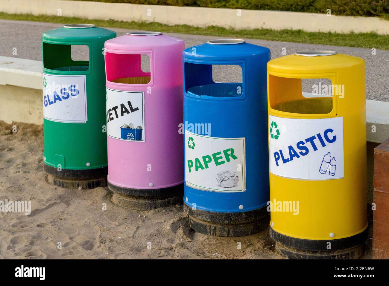 Garbage in colored trash cans with sorted garbage icons. plastic, paper ...