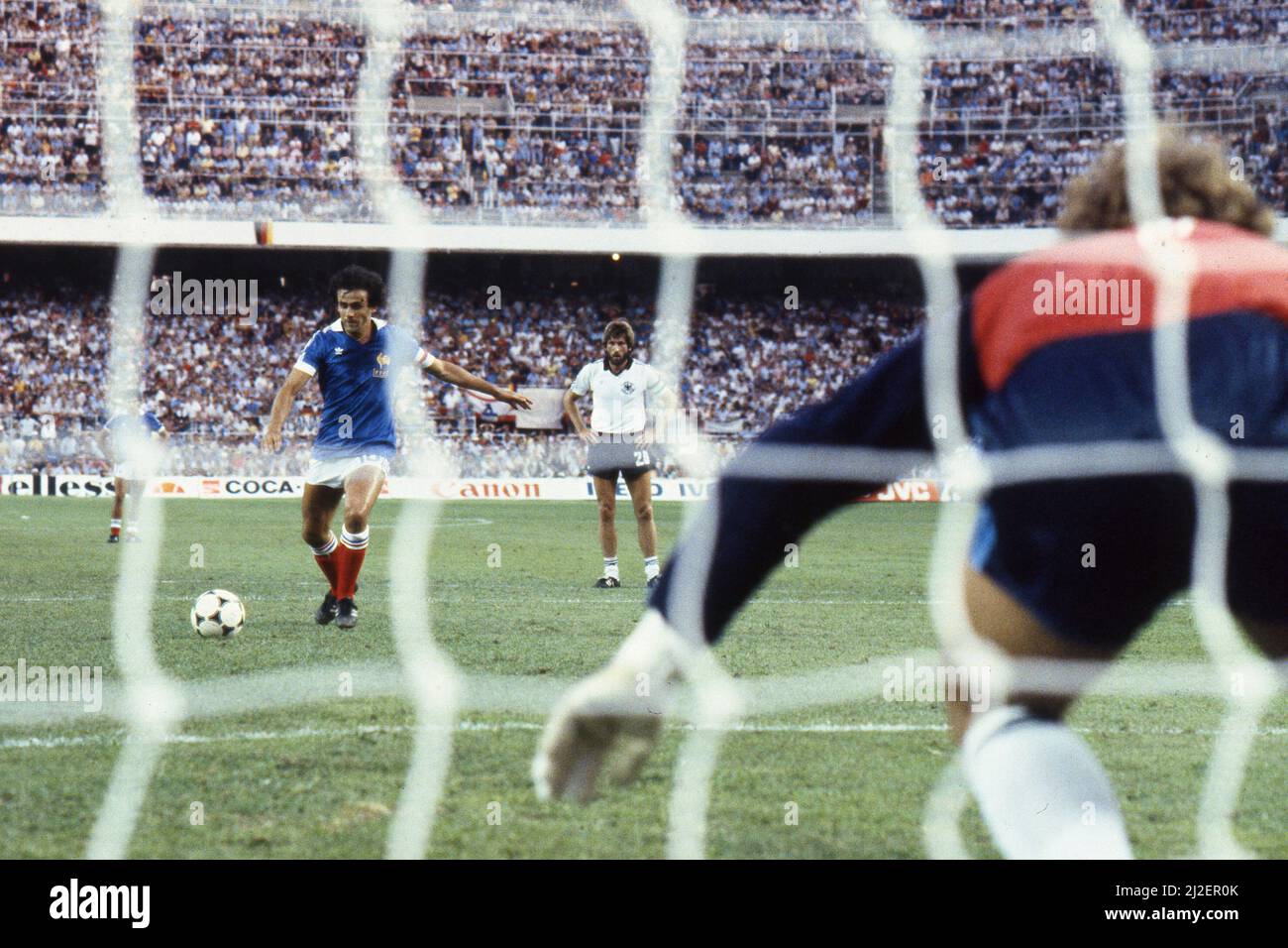 Michelle PLATINI (FRA) converts his penalty kick versus goalwart Harald ...
