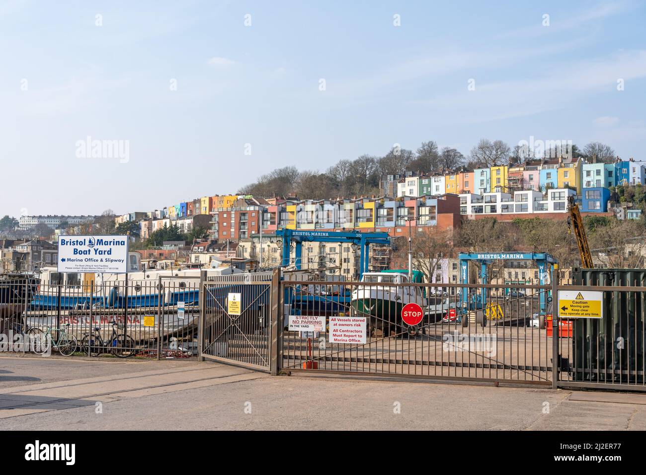Bristol Marina Boat Yard, with terraces of pretty houses behind ...