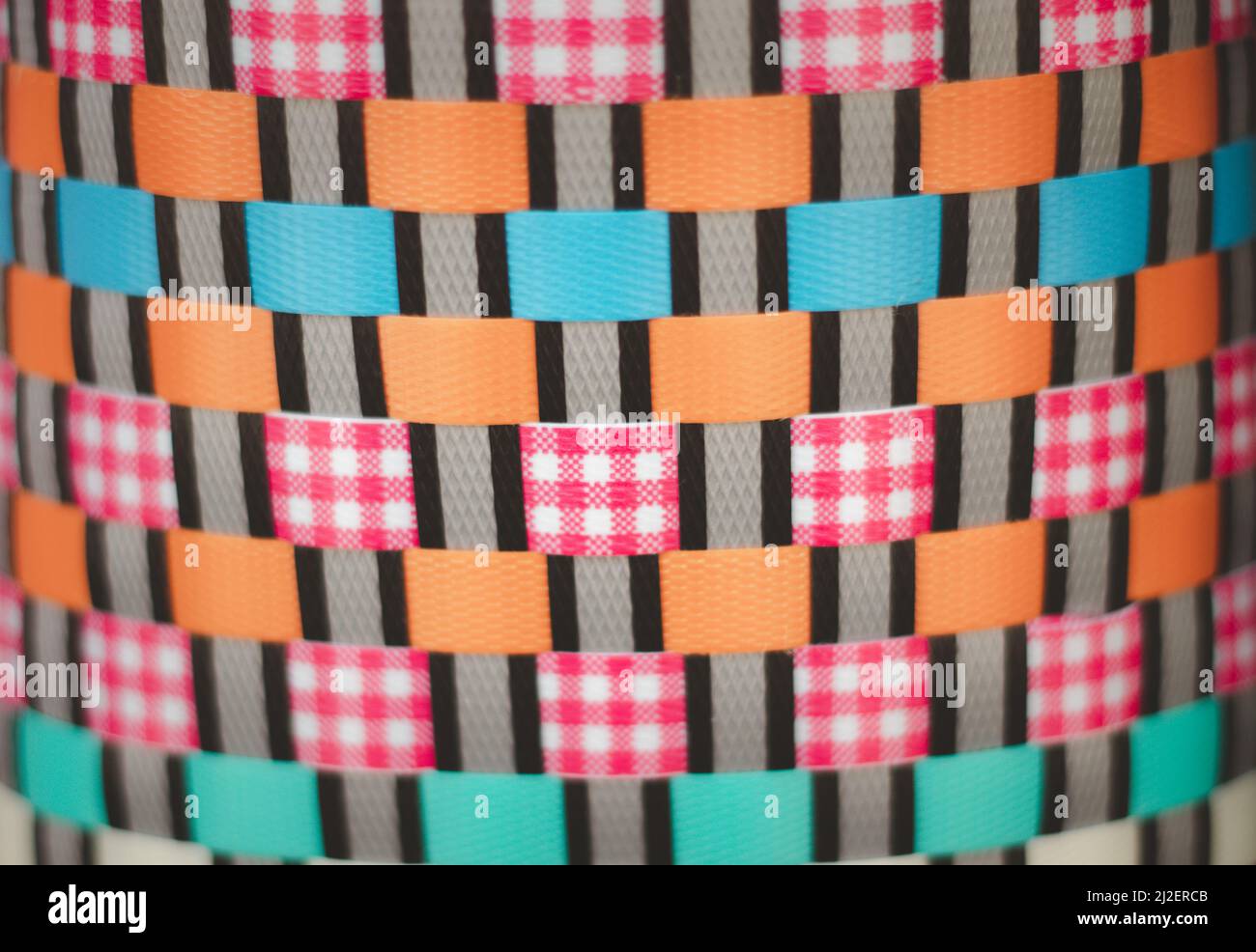 Decorative braiding with red and blue plastic ropes Stock Photo - Alamy