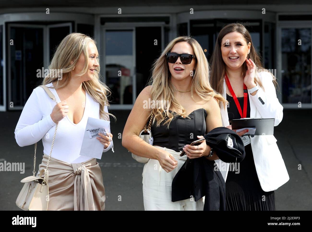 Racegoers arrive during the Coral Scottish Grand National Ladies Day at ...