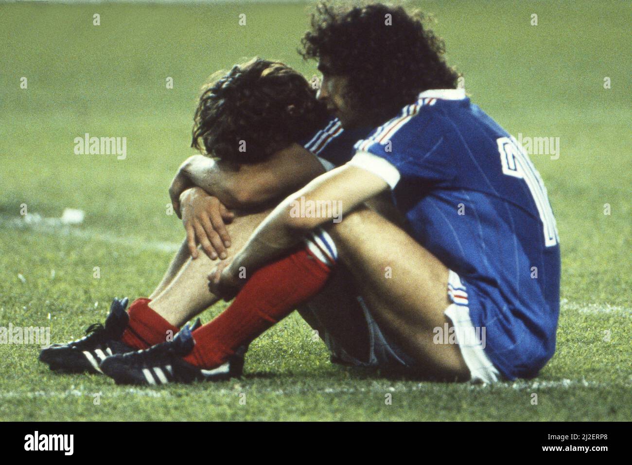 Dominique ROCHETEAU and Bernard GENGHINI (FRA) sit on the pitch during ...