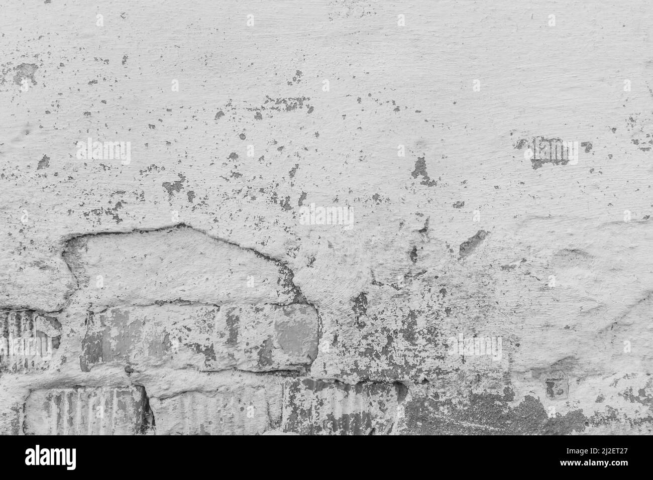 Old cement white wall and ruined texture brick worn facade damage ...