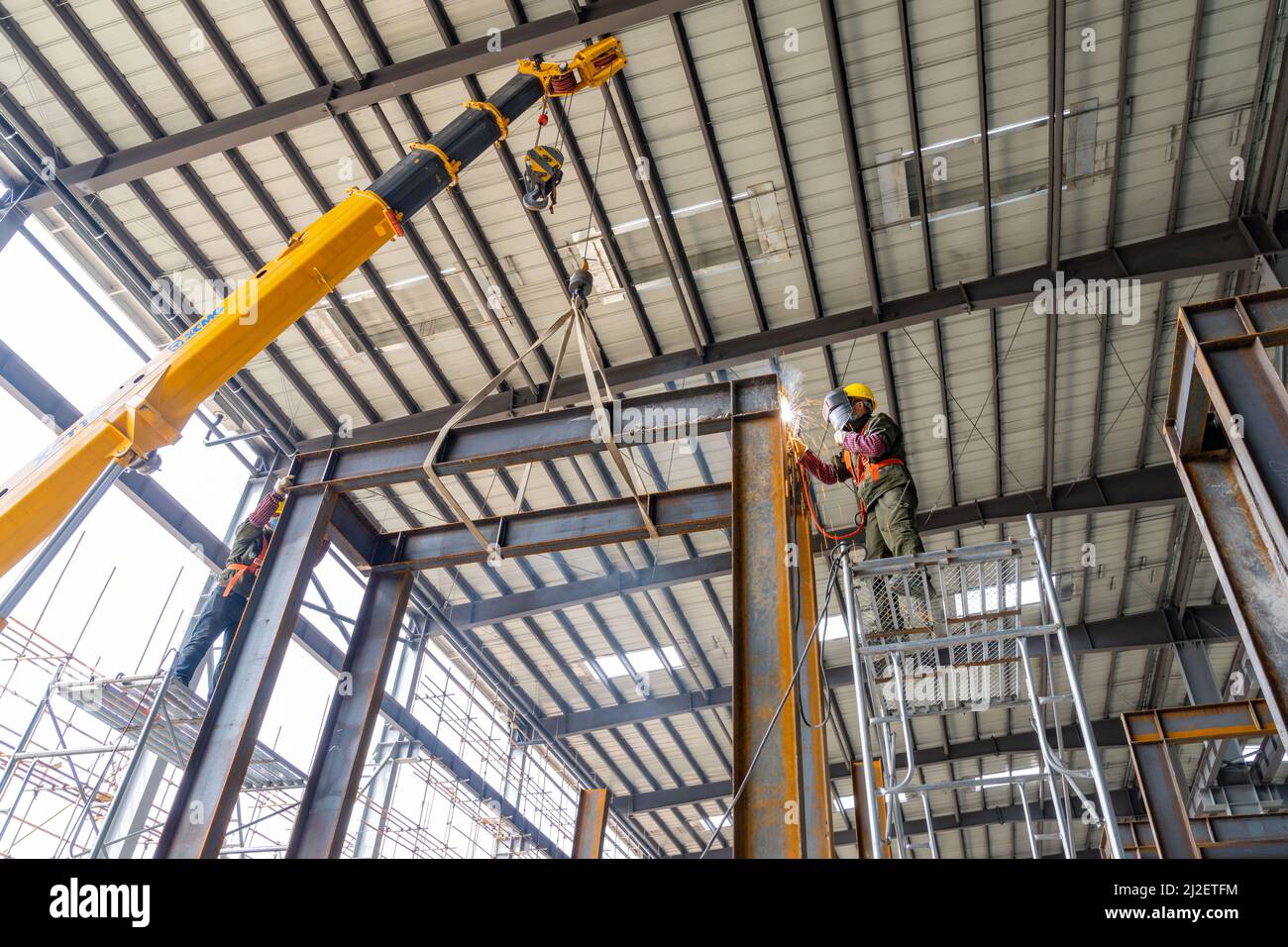 HEFEI, CHINA - APRIL 1, 2022 - Workers build a production plant at the ...
