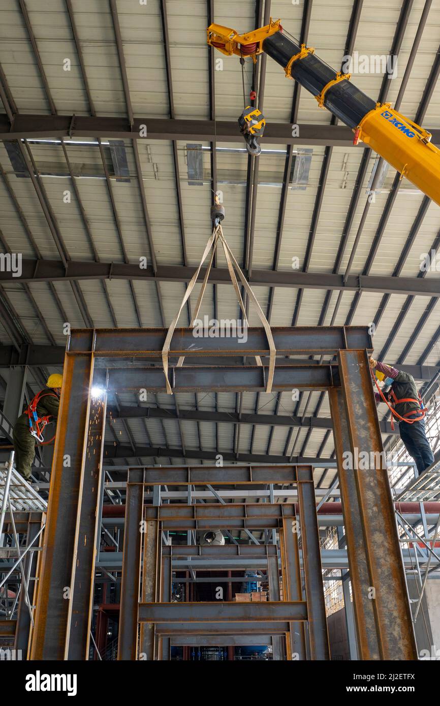 HEFEI, CHINA - APRIL 1, 2022 - Workers build a production plant at the ...