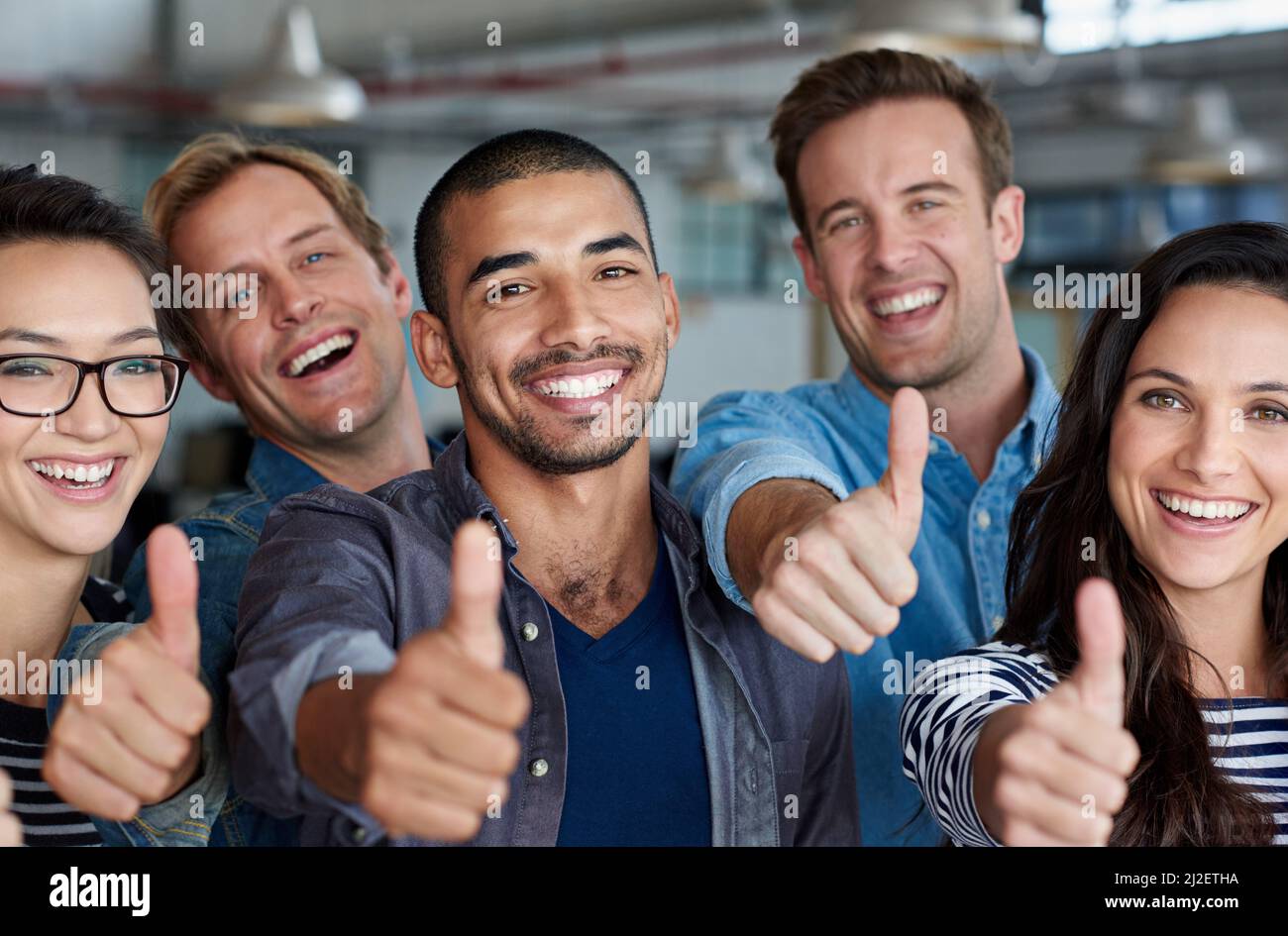 Were all systems go. Positive group of creative professionals smiling ...