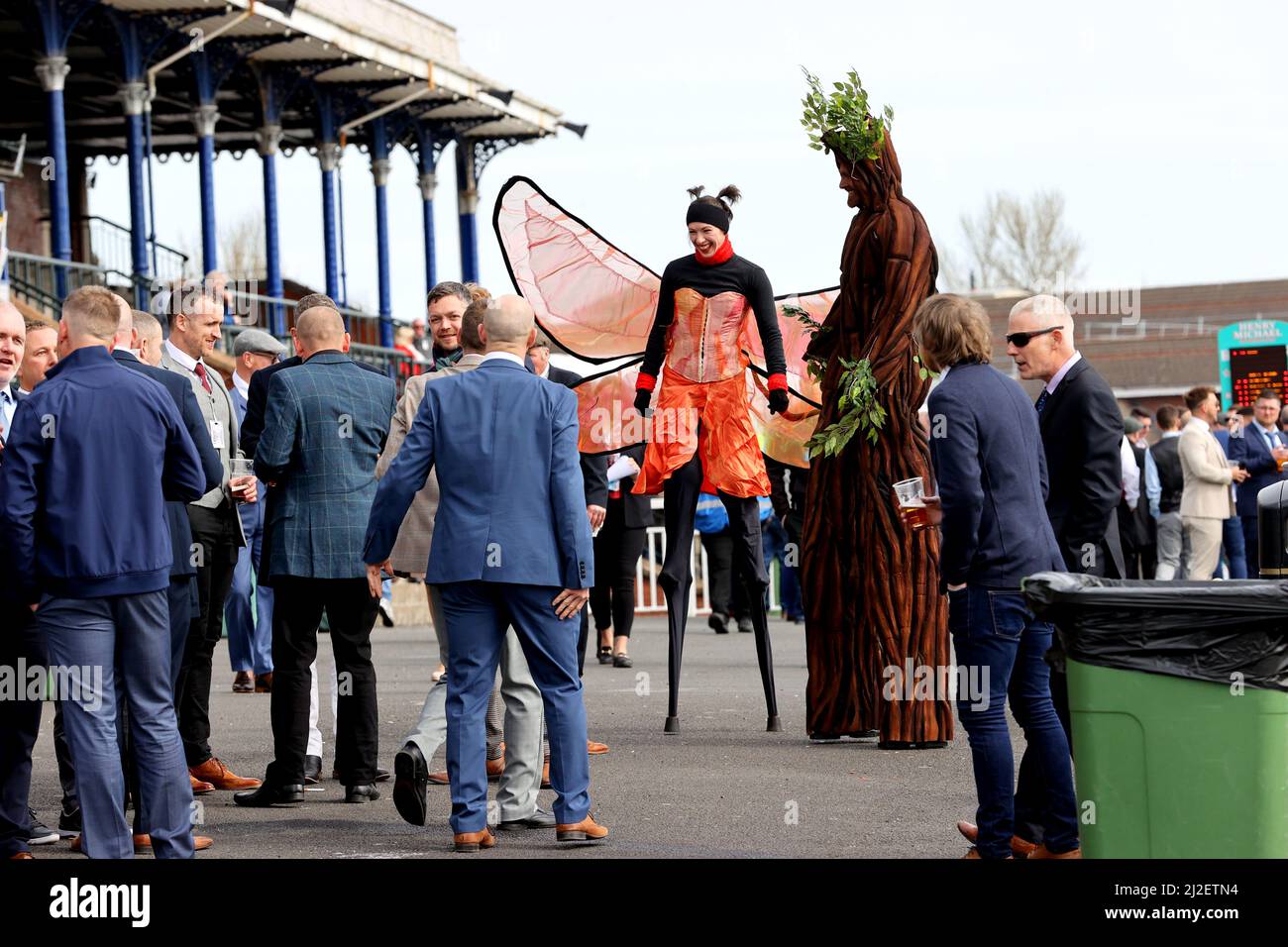 Stilt walkers during the Coral Scottish Grand National Ladies Day at ...