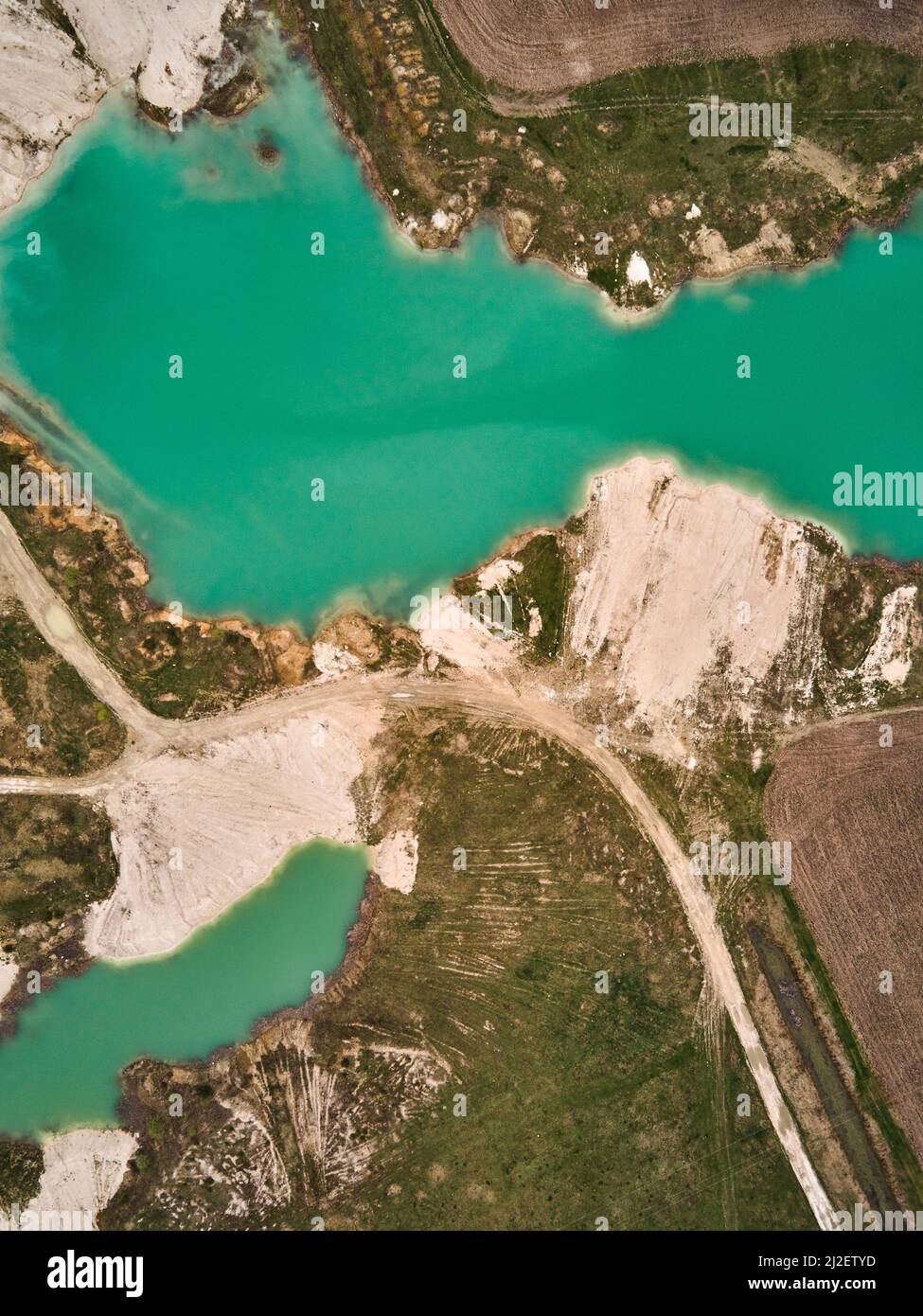 Aerial drone view Amazing industrial landscape, on Emerald lake in a ...
