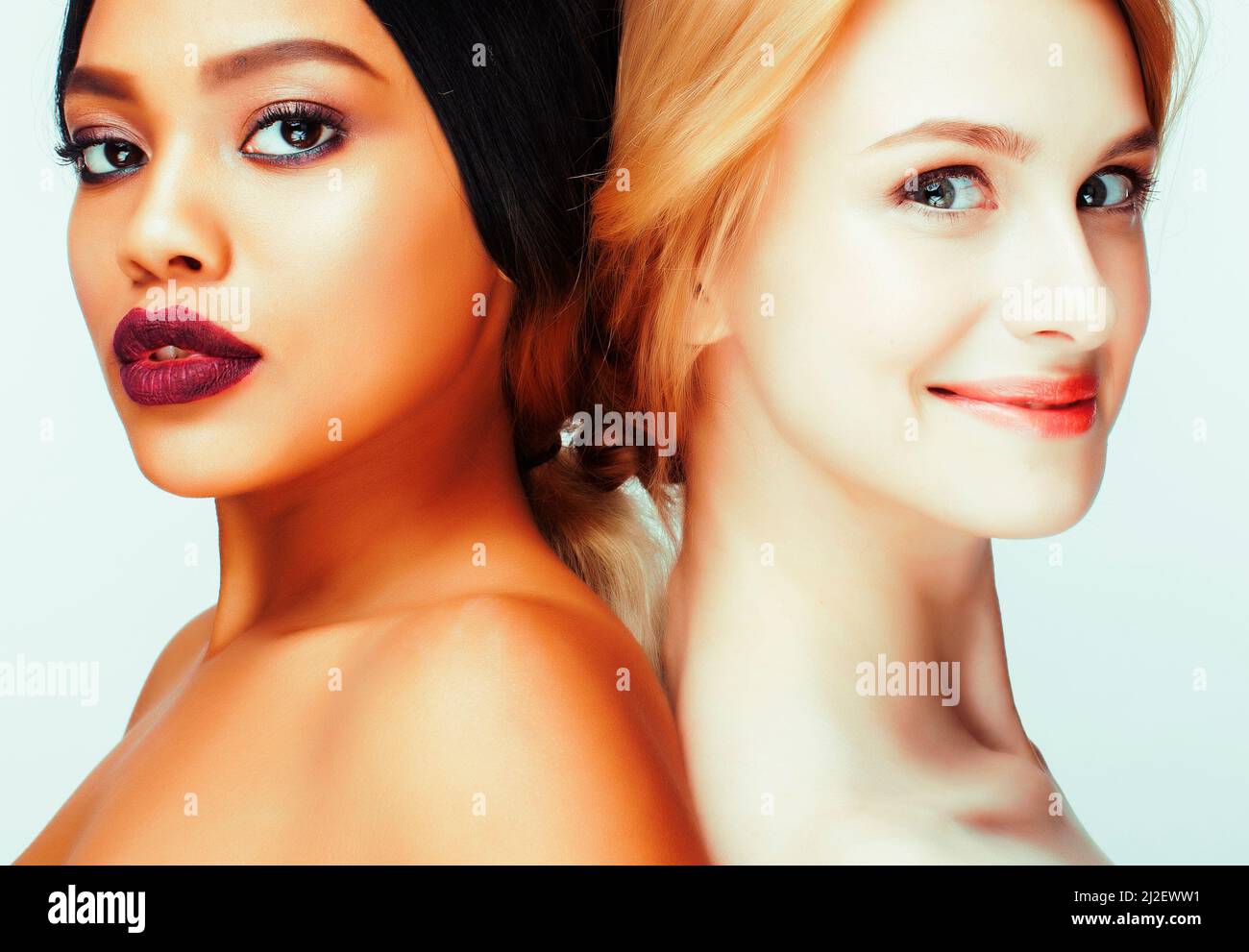 different nation woman: african-american and caucasian together ...